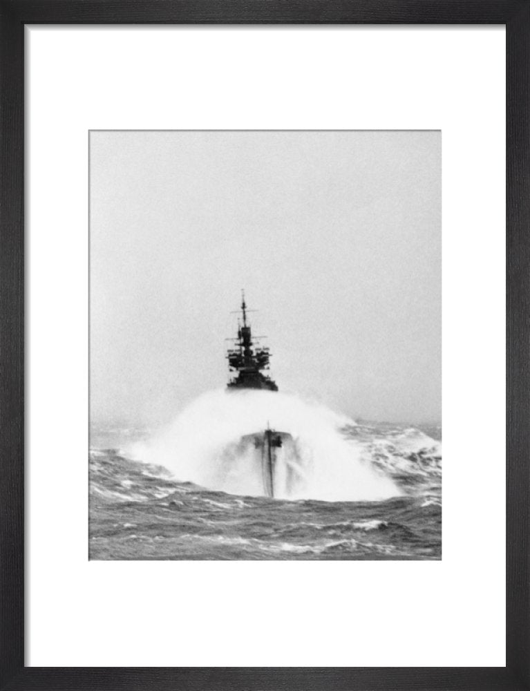 The battleship HMS DUKE OF YORK in heavy seas on a convoy escort opera ...