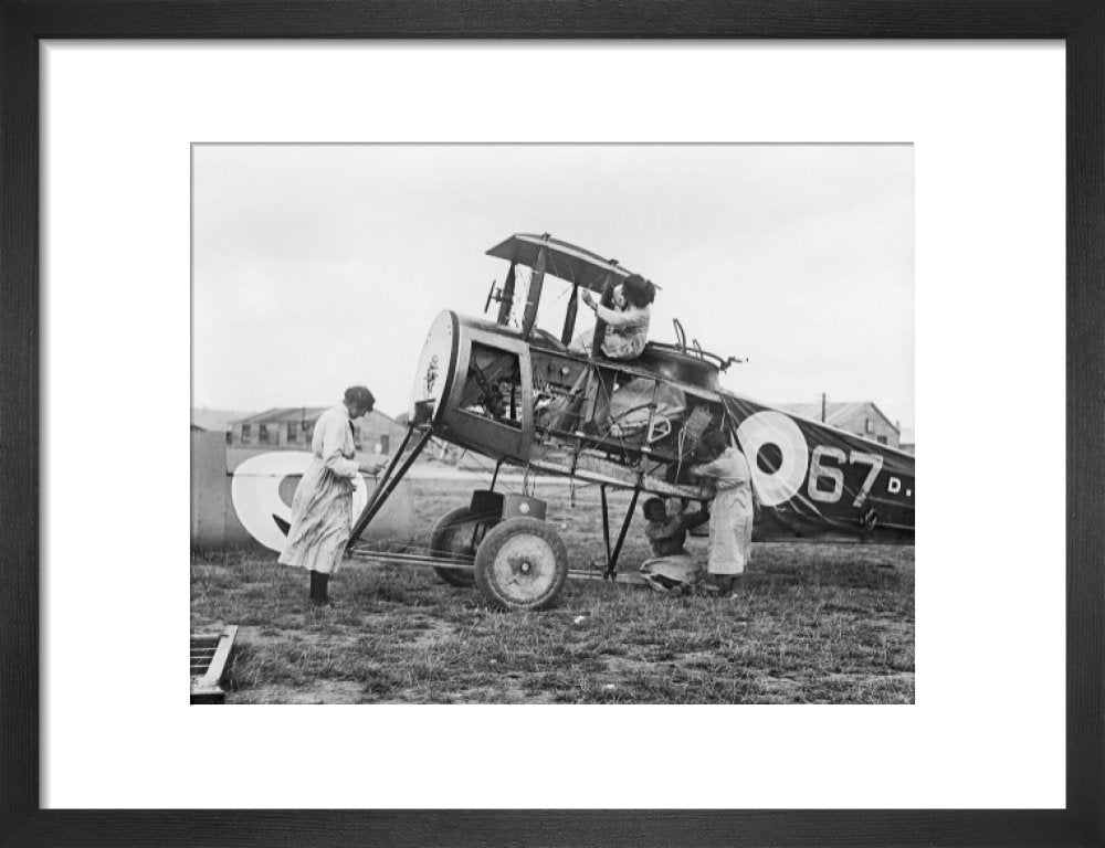 Air Mechanics of the Women's Royal Air Force (WRAF) working on the fus ...