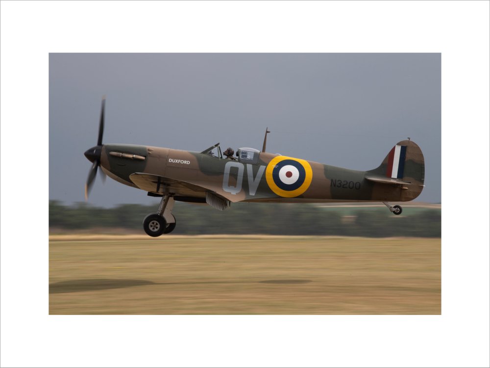 Spitfire Mk1A N3200 coming in to land after its display – IWM Prints